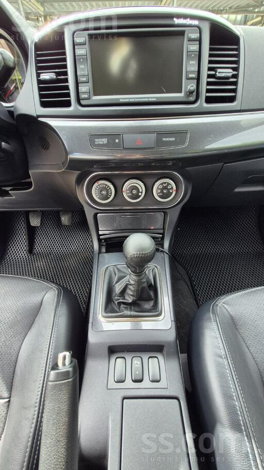 Melns Mitsubishi Lancer 2011 Rīga, ar dzinēja tilpumu 2.00 L un nobraukumu 244 tūkst. km par 4200 €, foto 5 vietnē AUTOMOTO.COM.LV