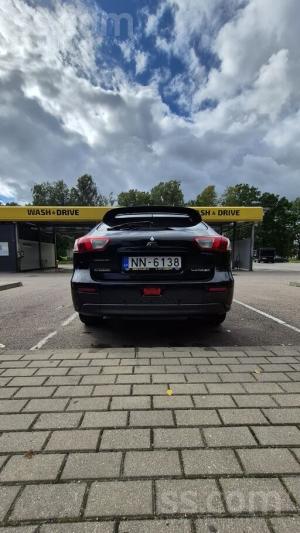 Melns Mitsubishi Lancer 2011 Rīga, ar dzinēja tilpumu 2.00 L un nobraukumu 244 tūkst. km par 4200 €, foto 8 vietnē AUTOMOTO.COM.LV