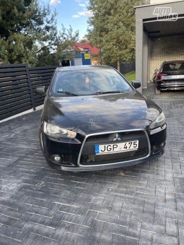 Black Mitsubishi Lancer 2012 in Vilnius, with an engine capacity of 2.00 L and mileage of 470 thousand km for 2000 €, photo 2 on AUTOMOTO.COM.LV