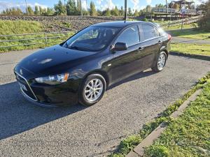 Melns Mitsubishi Lancer 2012 Tallina, ar dzinēja tilpumu 1.80 L un nobraukumu 121 tūkst. km par 4000 €, foto  vietnē AUTOMOTO.COM.LV