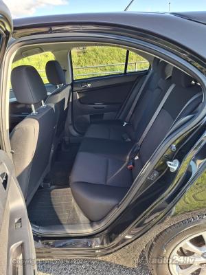 Melns Mitsubishi Lancer 2012 Tallina, ar dzinēja tilpumu 1.80 L un nobraukumu 121 tūkst. km par 4000 €, foto 8 vietnē AUTOMOTO.COM.LV
