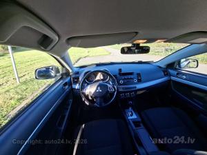 Melns Mitsubishi Lancer 2012 Tallina, ar dzinēja tilpumu 1.80 L un nobraukumu 121 tūkst. km par 4000 €, foto 10 vietnē AUTOMOTO.COM.LV