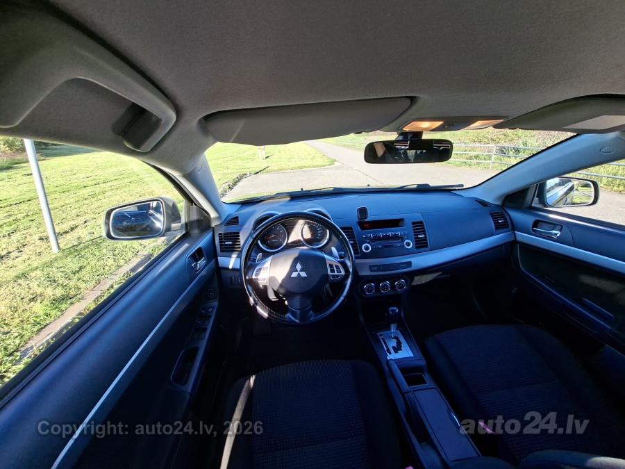 Melns Mitsubishi Lancer 2012 Tallina, ar dzinēja tilpumu 1.80 L un nobraukumu 121 tūkst. km par 4000 €, foto 10 vietnē AUTOMOTO.COM.LV
