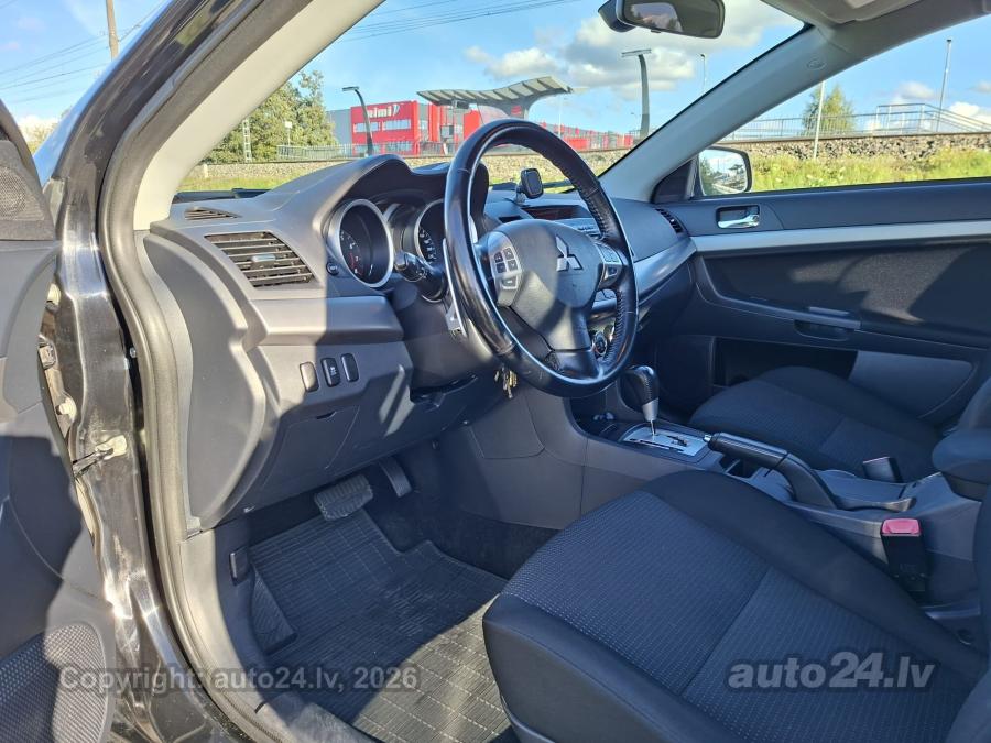 Melns Mitsubishi Lancer 2012 Tallina, ar dzinēja tilpumu 1.80 L un nobraukumu 121 tūkst. km par 4000 €, foto 12 vietnē AUTOMOTO.COM.LV