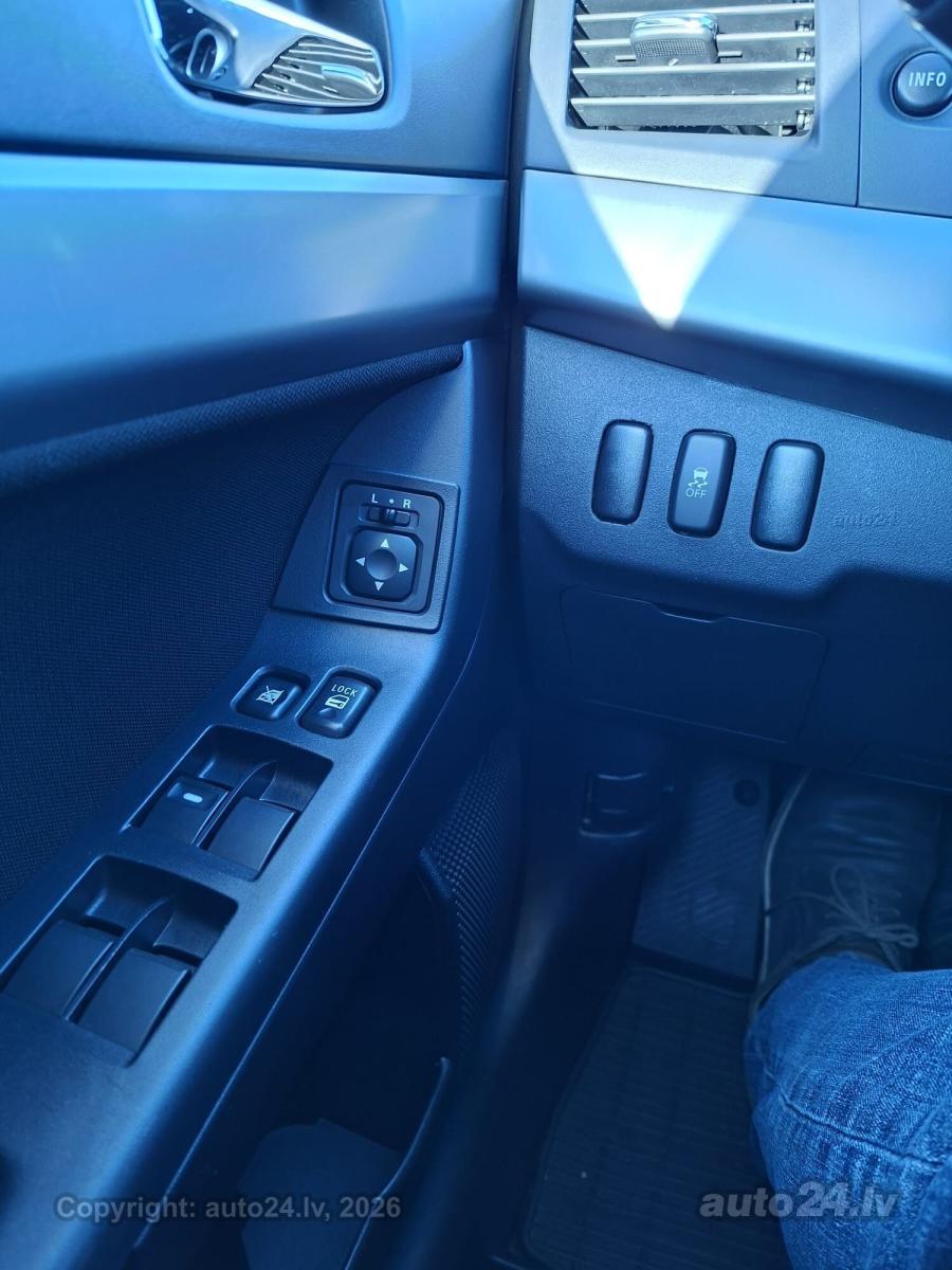 Melns Mitsubishi Lancer 2012 Tallina, ar dzinēja tilpumu 1.80 L un nobraukumu 121 tūkst. km par 4000 €, foto 14 vietnē AUTOMOTO.COM.LV