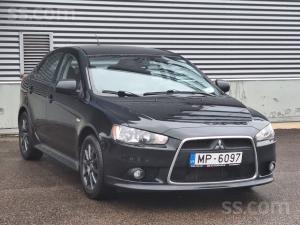 Melns Mitsubishi Lancer 2013 Rīga, ar dzinēja tilpumu 1.80 L un nobraukumu 243 tūkst. km par 3550 €, foto 4 vietnē AUTOMOTO.COM.LV