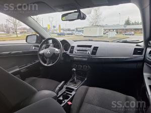 Melns Mitsubishi Lancer 2013 Rīga, ar dzinēja tilpumu 1.80 L un nobraukumu 243 tūkst. km par 3550 €, foto 6 vietnē AUTOMOTO.COM.LV