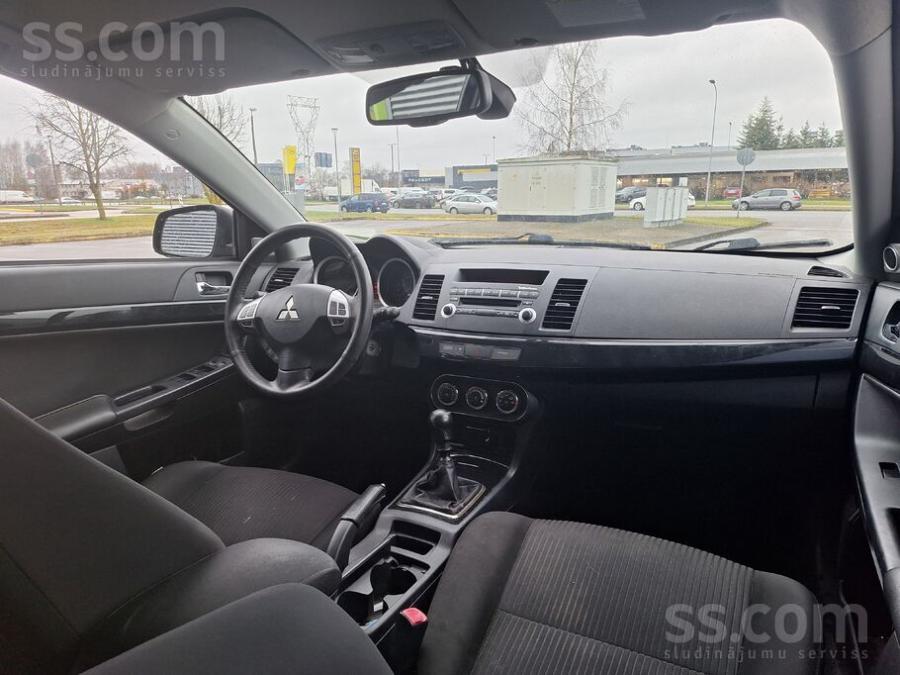 Melns Mitsubishi Lancer 2013 Rīga, ar dzinēja tilpumu 1.80 L un nobraukumu 243 tūkst. km par 3550 €, foto 6 vietnē AUTOMOTO.COM.LV
