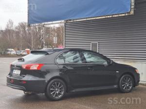 Melns Mitsubishi Lancer 2013 Rīga, ar dzinēja tilpumu 1.80 L un nobraukumu 243 tūkst. km par 3550 €, foto 7 vietnē AUTOMOTO.COM.LV