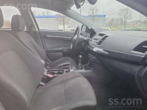 Melns Mitsubishi Lancer 2013 Rīga, ar dzinēja tilpumu 1.80 L un nobraukumu 243 tūkst. km par 3550 €, foto 11 vietnē AUTOMOTO.COM.LV