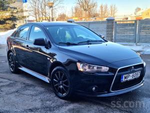 Black Mitsubishi Lancer 2013 in Jelgava, with an engine capacity of 2.00 L and mileage of 242 thousand km for 4999 €, photo 4 on AUTOMOTO.COM.LV