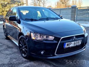 Black Mitsubishi Lancer 2013 in Jelgava, with an engine capacity of 2.00 L and mileage of 242 thousand km for 4999 €, photo 5 on AUTOMOTO.COM.LV
