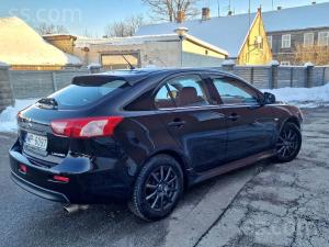 Black Mitsubishi Lancer 2013 in Jelgava, with an engine capacity of 2.00 L and mileage of 242 thousand km for 4999 €, photo 6 on AUTOMOTO.COM.LV