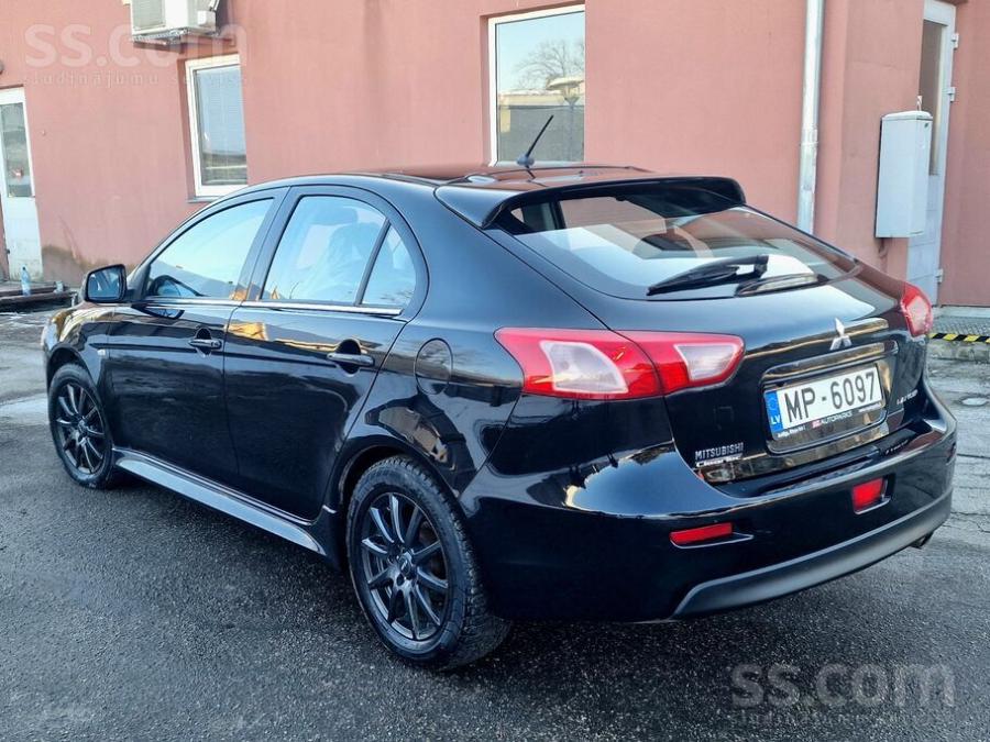 Black Mitsubishi Lancer 2013 in Jelgava, with an engine capacity of 2.00 L and mileage of 242 thousand km for 4999 €, photo 8 on AUTOMOTO.COM.LV