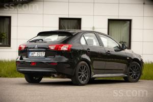 Melns Mitsubishi Lancer 2013 Jelgava, ar dzinēja tilpumu 1.80 L un nobraukumu 243 tūkst. km par 4999 €, foto 8 vietnē AUTOMOTO.COM.LV