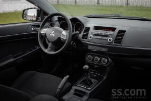 Melns Mitsubishi Lancer 2013 Jelgava, ar dzinēja tilpumu 1.80 L un nobraukumu 243 tūkst. km par 4999 €, foto 12 vietnē AUTOMOTO.COM.LV