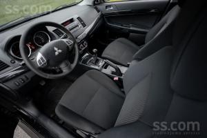 Melns Mitsubishi Lancer 2013 Jelgava, ar dzinēja tilpumu 1.80 L un nobraukumu 243 tūkst. km par 4999 €, foto 15 vietnē AUTOMOTO.COM.LV