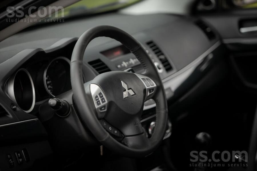 Melns Mitsubishi Lancer 2013 Jelgava, ar dzinēja tilpumu 1.80 L un nobraukumu 243 tūkst. km par 4999 €, foto 17 vietnē AUTOMOTO.COM.LV