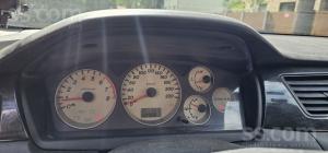 Black Mitsubishi Lancer 2005 in Riga, with an engine capacity of 1.40 L and mileage of 130 thousand km for 1200 €, photo 5 on AUTOMOTO.COM.LV