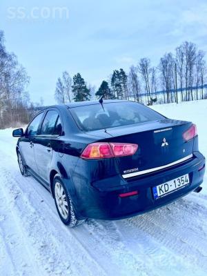 Black Mitsubishi Lancer 2007 in Aizkraukle, with an engine capacity of 2.00 L and mileage of 384 thousand km for 3200 €, photo  on AUTOMOTO.COM.LV