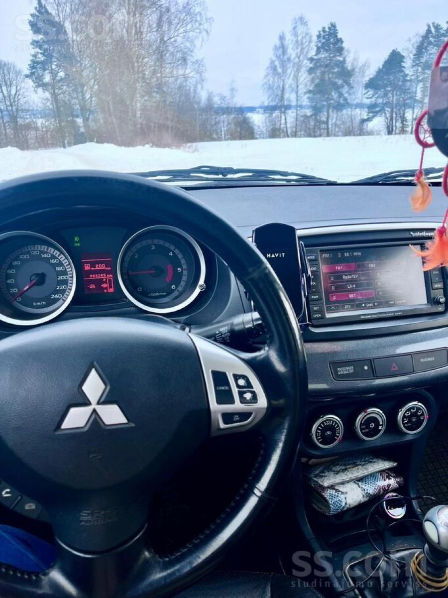 Black Mitsubishi Lancer 2007 in Aizkraukle, with an engine capacity of 2.00 L and mileage of 384 thousand km for 3200 €, photo 3 on AUTOMOTO.COM.LV