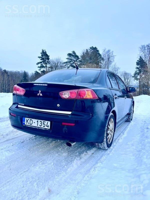 Black Mitsubishi Lancer 2007 in Aizkraukle, with an engine capacity of 2.00 L and mileage of 384 thousand km for 3200 €, photo 3 on AUTOMOTO.COM.LV