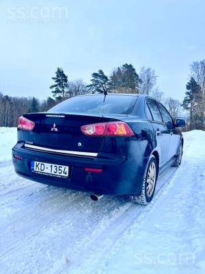 Black Mitsubishi Lancer 2007 in Aizkraukle, with an engine capacity of 2.00 L and mileage of 384 thousand km for 3200 €, photo 4 on AUTOMOTO.COM.LV