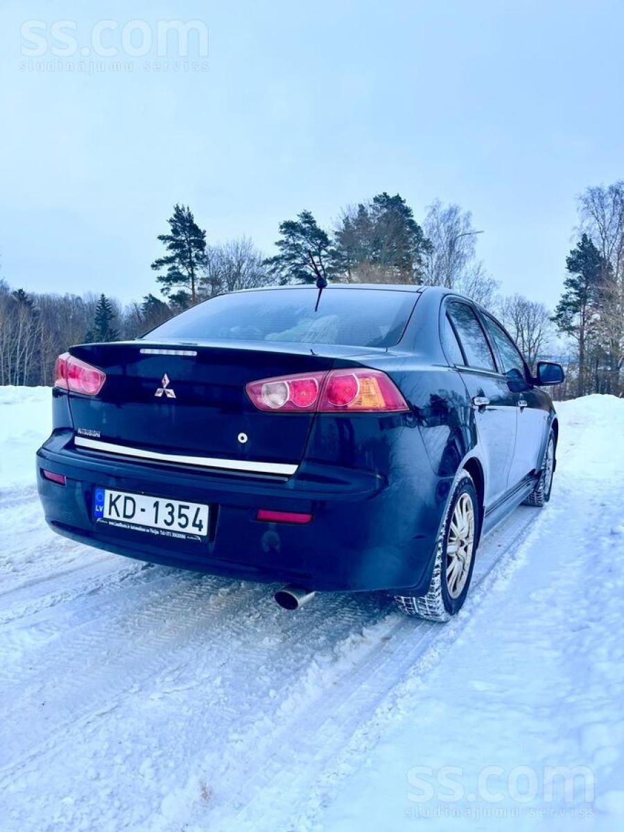 Black Mitsubishi Lancer 2007 in Aizkraukle, with an engine capacity of 2.00 L and mileage of 384 thousand km for 3200 €, photo 4 on AUTOMOTO.COM.LV