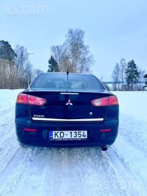 Black Mitsubishi Lancer 2007 in Aizkraukle, with an engine capacity of 2.00 L and mileage of 384 thousand km for 3200 €, photo 5 on AUTOMOTO.COM.LV