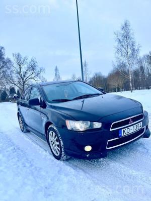 Black Mitsubishi Lancer 2007 in Aizkraukle, with an engine capacity of 2.00 L and mileage of 384 thousand km for 3200 €, photo 6 on AUTOMOTO.COM.LV