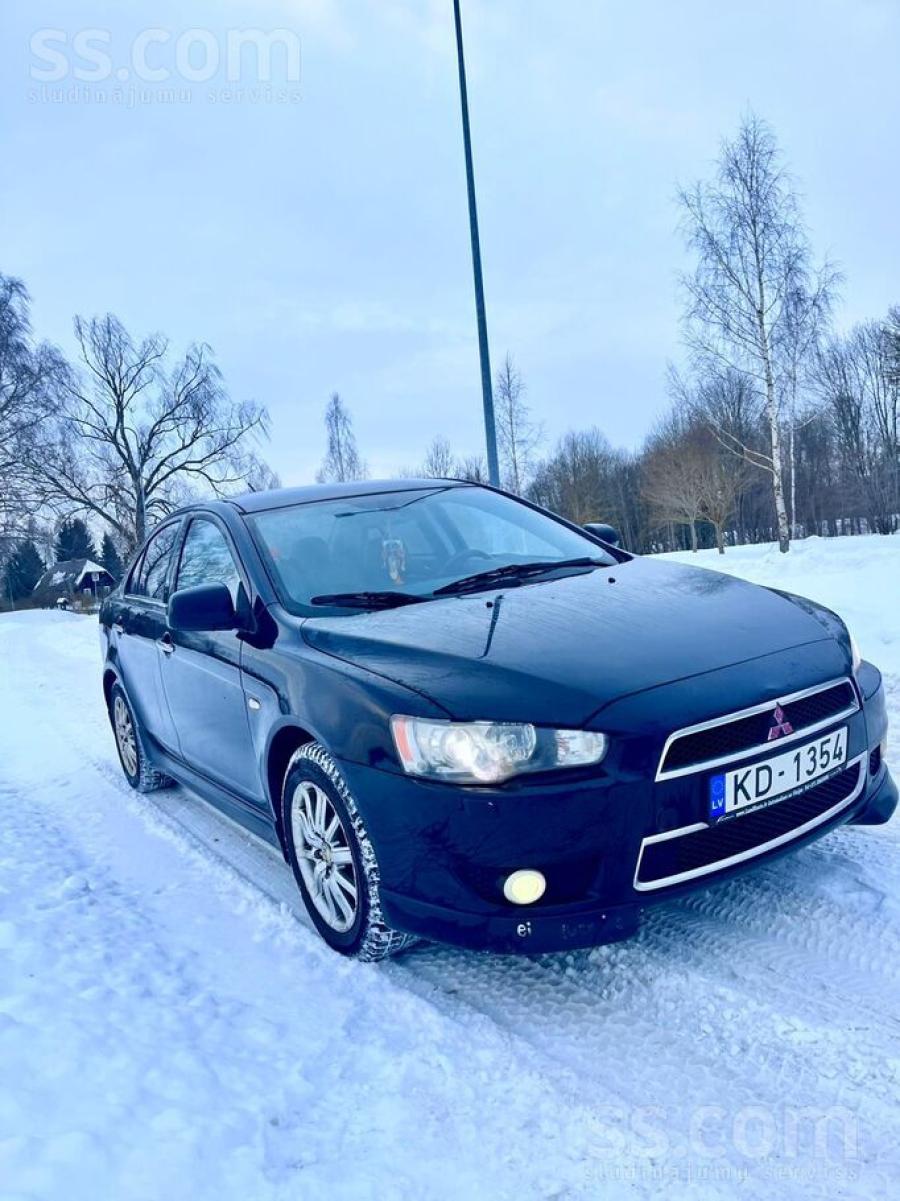 Black Mitsubishi Lancer 2007 in Aizkraukle, with an engine capacity of 2.00 L and mileage of 384 thousand km for 3200 €, photo 6 on AUTOMOTO.COM.LV