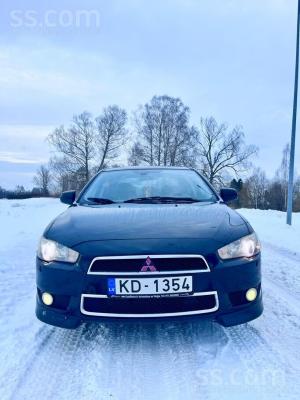 Black Mitsubishi Lancer 2007 in Aizkraukle, with an engine capacity of 2.00 L and mileage of 384 thousand km for 3200 €, photo 7 on AUTOMOTO.COM.LV