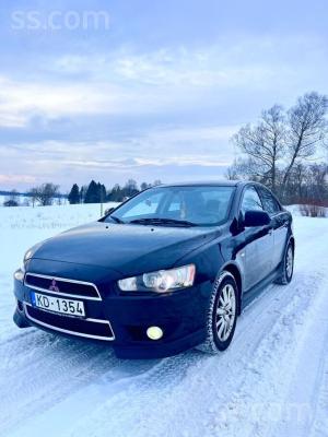 Black Mitsubishi Lancer 2007 in Aizkraukle, with an engine capacity of 2.00 L and mileage of 384 thousand km for 3200 €, photo 8 on AUTOMOTO.COM.LV