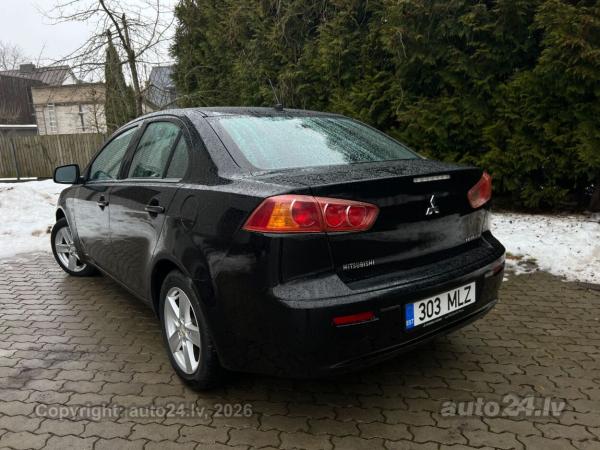 Black Mitsubishi Lancer 2008 in Tallinn, with an engine capacity of 1.80 L and mileage of 125 thousand km for 1475 €, photo 3 on AUTOMOTO.COM.LV