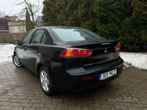 Black Mitsubishi Lancer 2008 in Tallinn, with an engine capacity of 1.80 L and mileage of 125 thousand km for 1475 €, photo 3 on AUTOMOTO.COM.LV