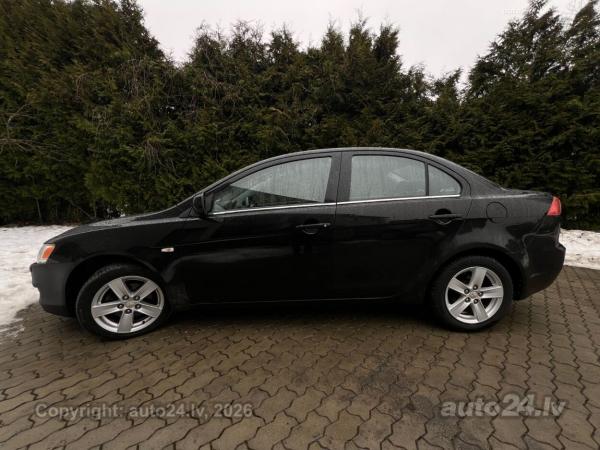 Black Mitsubishi Lancer 2008 in Tallinn, with an engine capacity of 1.80 L and mileage of 125 thousand km for 1475 €, photo 4 on AUTOMOTO.COM.LV