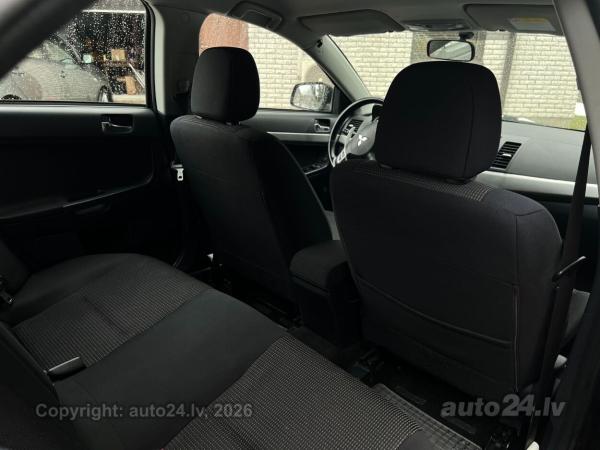 Black Mitsubishi Lancer 2008 in Tallinn, with an engine capacity of 1.80 L and mileage of 125 thousand km for 1475 €, photo 7 on AUTOMOTO.COM.LV
