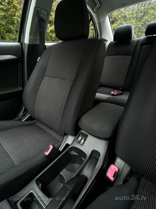 Black Mitsubishi Lancer 2008 in Tallinn, with an engine capacity of 1.80 L and mileage of 125 thousand km for 1475 €, photo 11 on AUTOMOTO.COM.LV