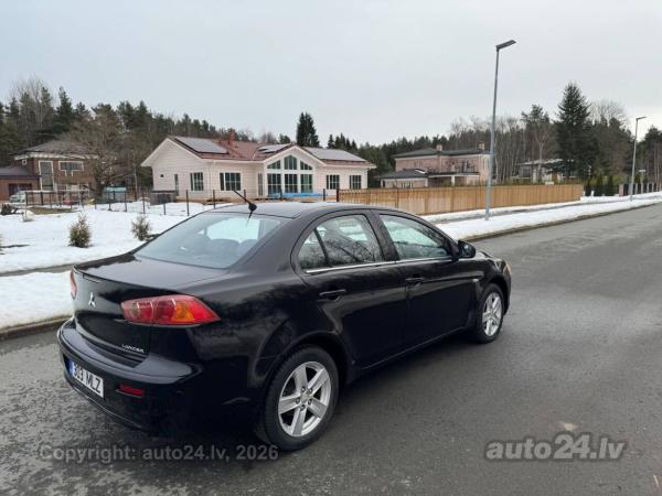 Black Mitsubishi Lancer 2008 in Tallinn, with an engine capacity of 1.80 L and mileage of 124 thousand km for 2990 €, photo 3 on AUTOMOTO.COM.LV