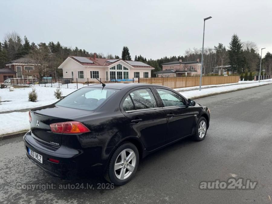 Black Mitsubishi Lancer 2008 in Tallinn, with an engine capacity of 1.80 L and mileage of 124 thousand km for 2990 €, photo 3 on AUTOMOTO.COM.LV