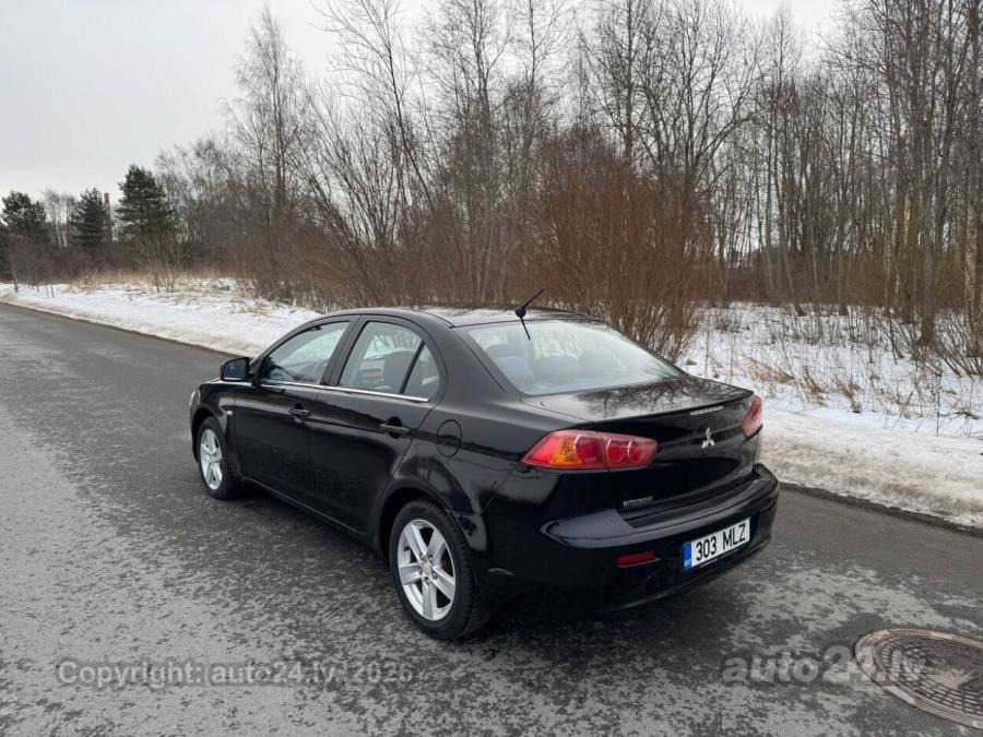 Black Mitsubishi Lancer 2008 in Tallinn, with an engine capacity of 1.80 L and mileage of 124 thousand km for 2990 €, photo 5 on AUTOMOTO.COM.LV
