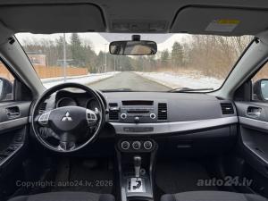Black Mitsubishi Lancer 2008 in Tallinn, with an engine capacity of 1.80 L and mileage of 124 thousand km for 2990 €, photo 6 on AUTOMOTO.COM.LV