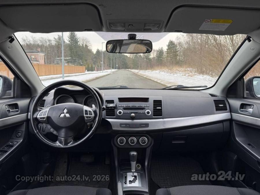 Black Mitsubishi Lancer 2008 in Tallinn, with an engine capacity of 1.80 L and mileage of 124 thousand km for 2990 €, photo 6 on AUTOMOTO.COM.LV