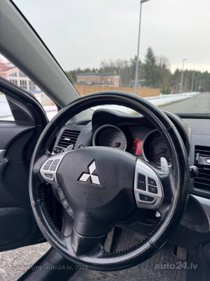 Black Mitsubishi Lancer 2008 in Tallinn, with an engine capacity of 1.80 L and mileage of 124 thousand km for 2990 €, photo 9 on AUTOMOTO.COM.LV
