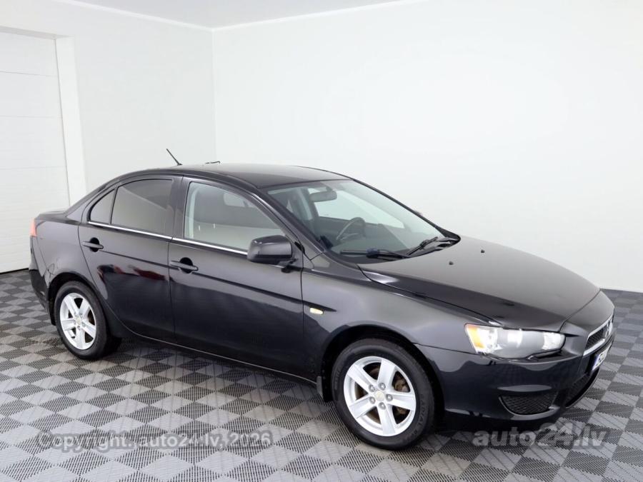 Black Mitsubishi Lancer 2008 in Tallinn, with an engine capacity of 1.50 L and mileage of 118 thousand km for 2499 €, photo 1 on AUTOMOTO.COM.LV