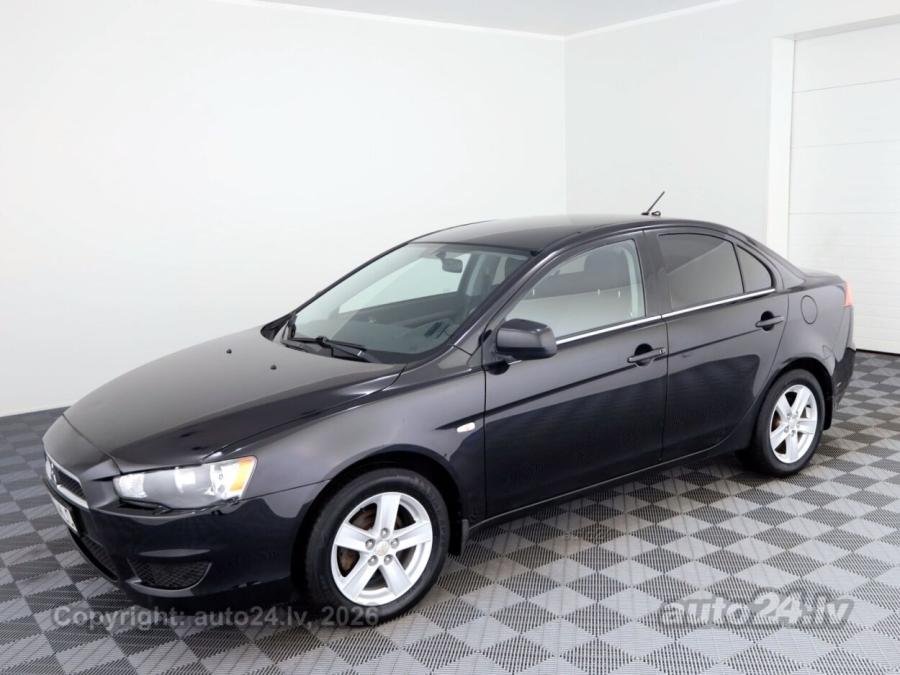 Black Mitsubishi Lancer 2008 in Tallinn, with an engine capacity of 1.50 L and mileage of 118 thousand km for 2499 €, photo 2 on AUTOMOTO.COM.LV