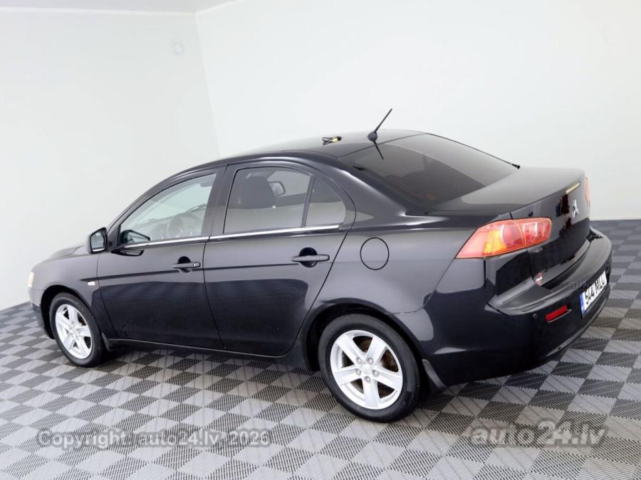 Black Mitsubishi Lancer 2008 in Tallinn, with an engine capacity of 1.50 L and mileage of 118 thousand km for 2499 €, photo 4 on AUTOMOTO.COM.LV