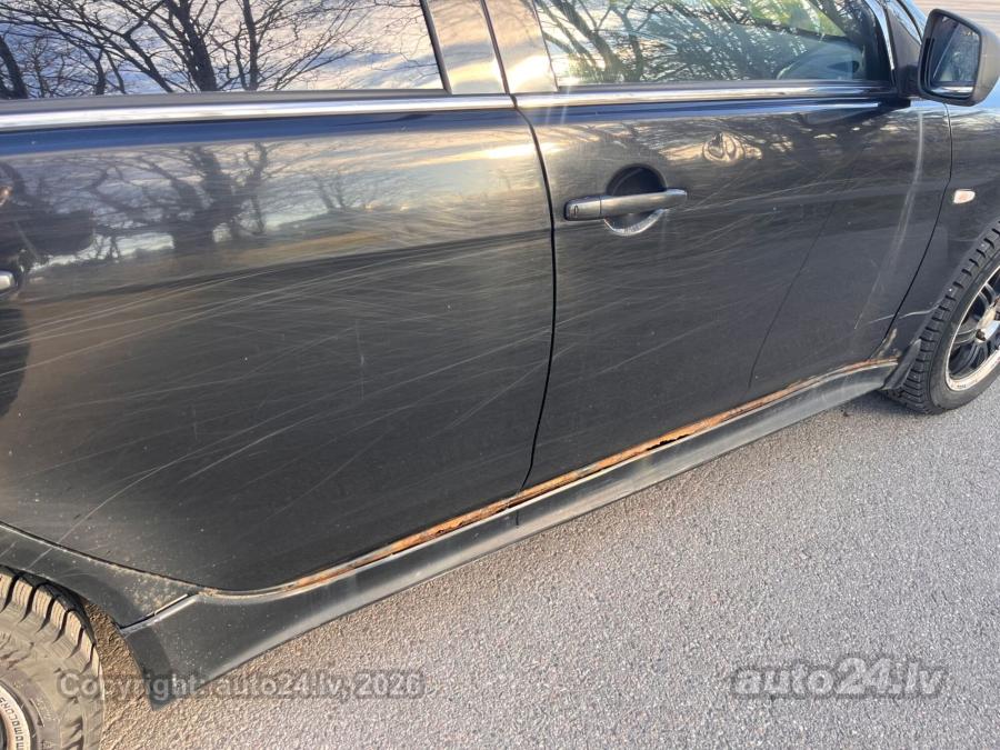 Black Mitsubishi Lancer 2008 in Tallinn, with an engine capacity of 1.80 L and mileage of 0 thousand km for 999 €, photo 6 on AUTOMOTO.COM.LV