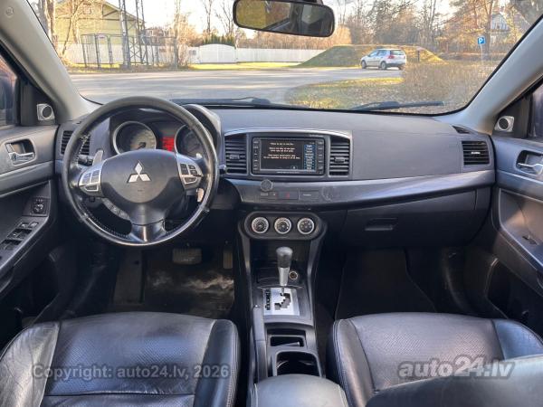 Black Mitsubishi Lancer 2008 in Tallinn, with an engine capacity of 1.80 L and mileage of 0 thousand km for 999 €, photo 9 on AUTOMOTO.COM.LV