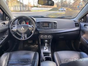 Black Mitsubishi Lancer 2008 in Tallinn, with an engine capacity of 1.80 L and mileage of 0 thousand km for 999 €, photo 10 on AUTOMOTO.COM.LV